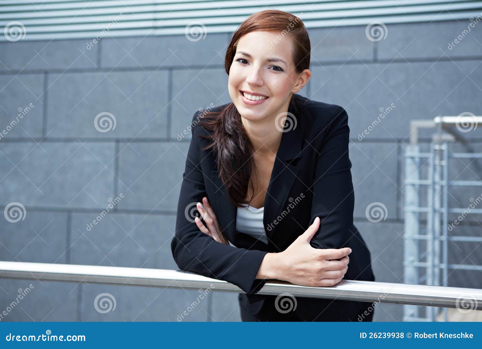 Business woman on railing stock photo. Image of portrait - 26239938