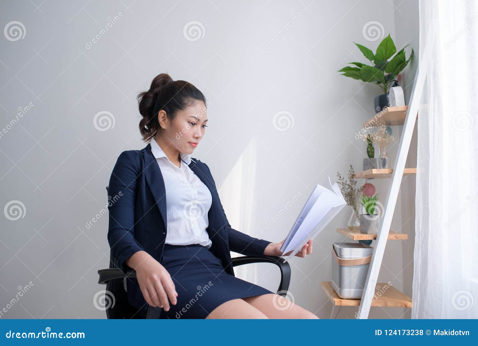 Business Woman Reading a Book at the Office Stock Photo - Image of ...
