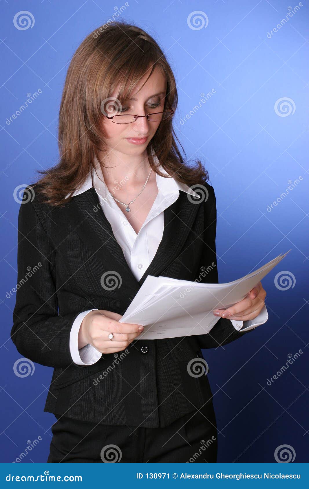 Business Woman Reading Documents Stock Image - Image of concentrated ...