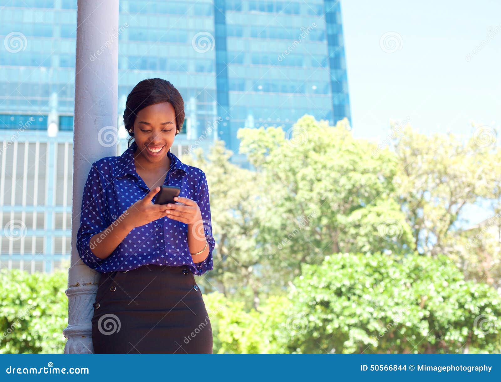 Business Woman Reading Text Message on Mobile Phone Outdoors Stock ...