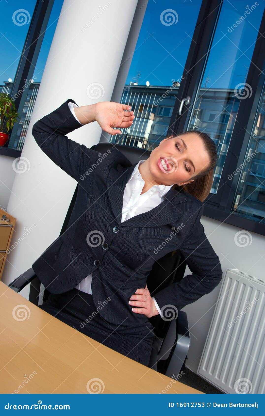 Business woman stretching stock image. Image of desk - 16912753