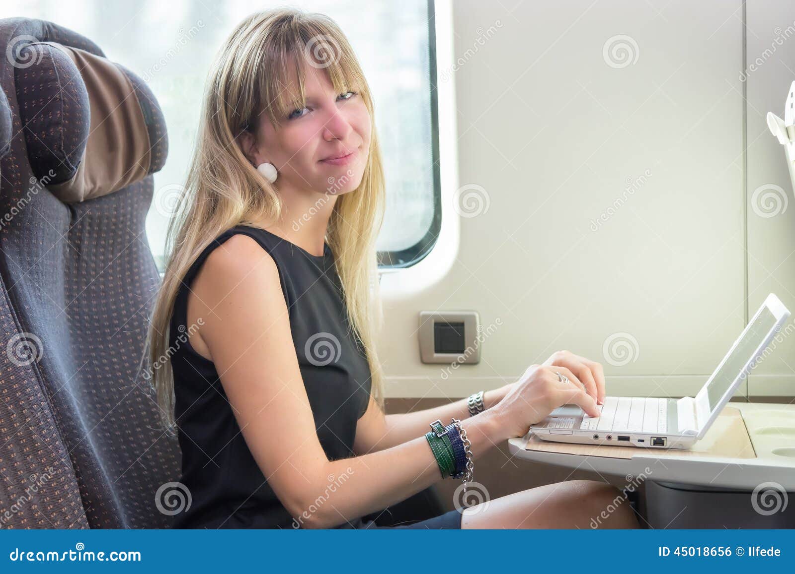 Business Woman Using Computer on Train Stock Photo - Image of caucasian ...