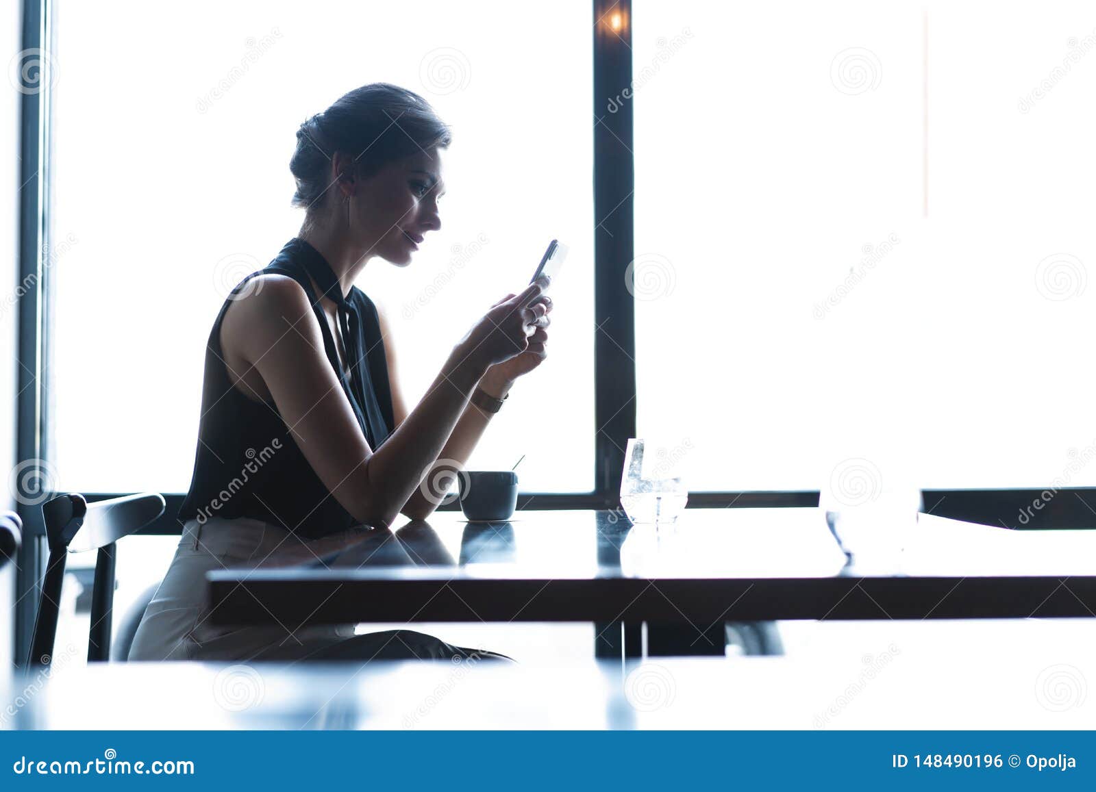 Business Woman Using Smartphone during Lunch in Cafe. Stock Photo ...