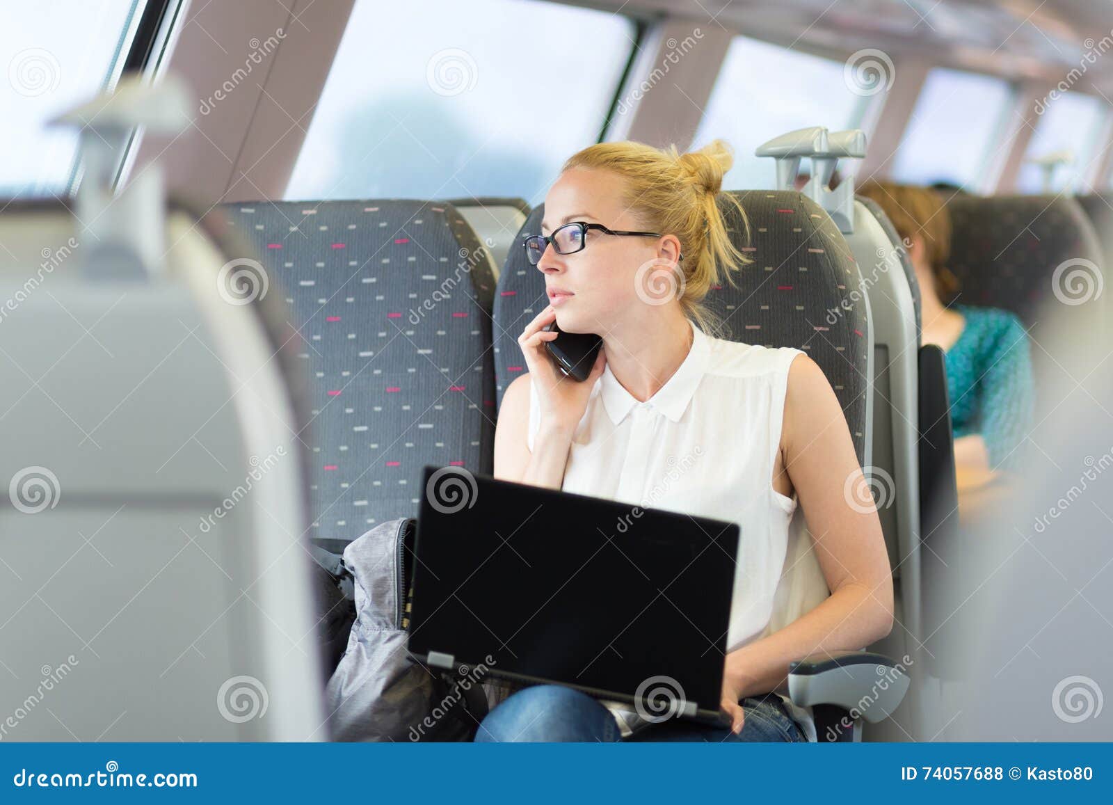 Business Woman Working while Travelling by Train. Stock Photo - Image ... Business Woman Working while Travelling by Train. Stock Photo - Image ...
