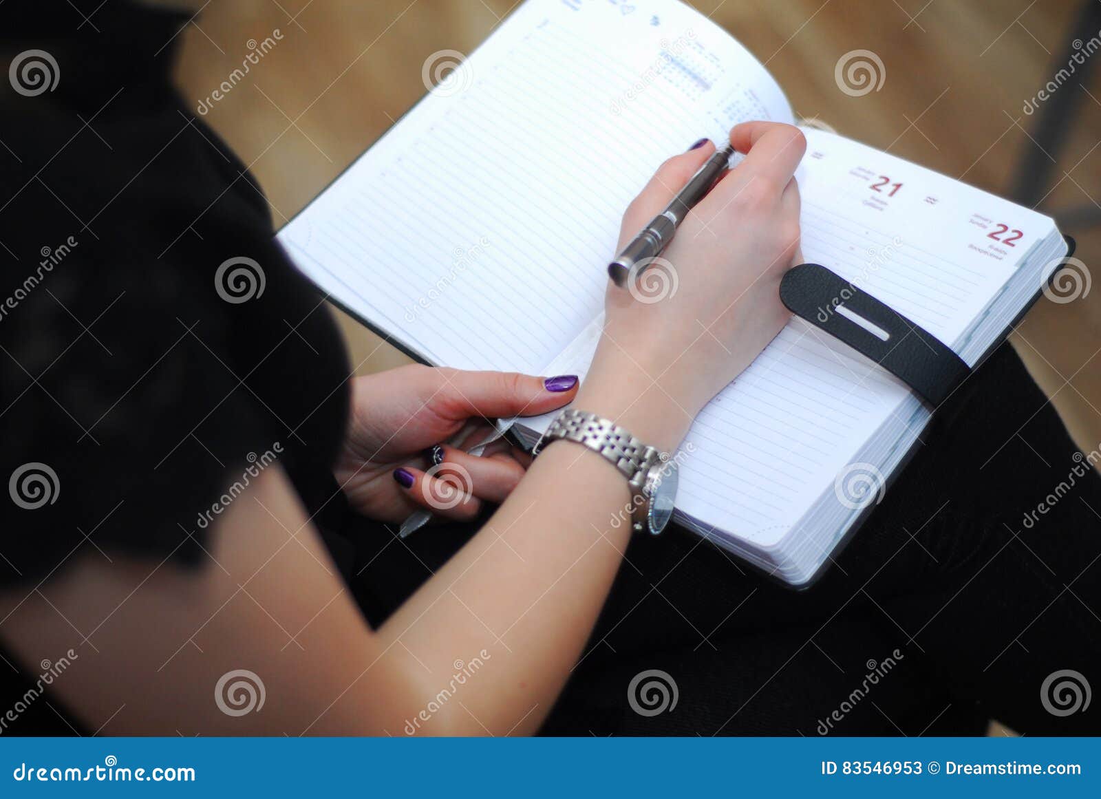 Business Woman Writes Notes in a Notebook Stock Image - Image of ...