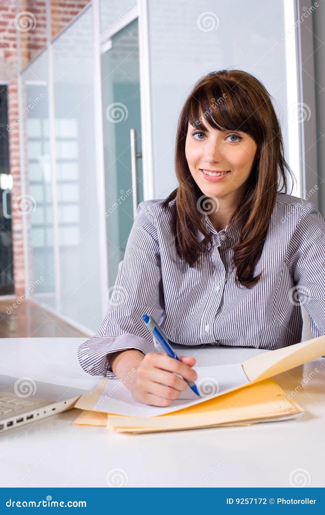 Business Woman Writing Notes at Desk Stock Photo - Image of loft ...