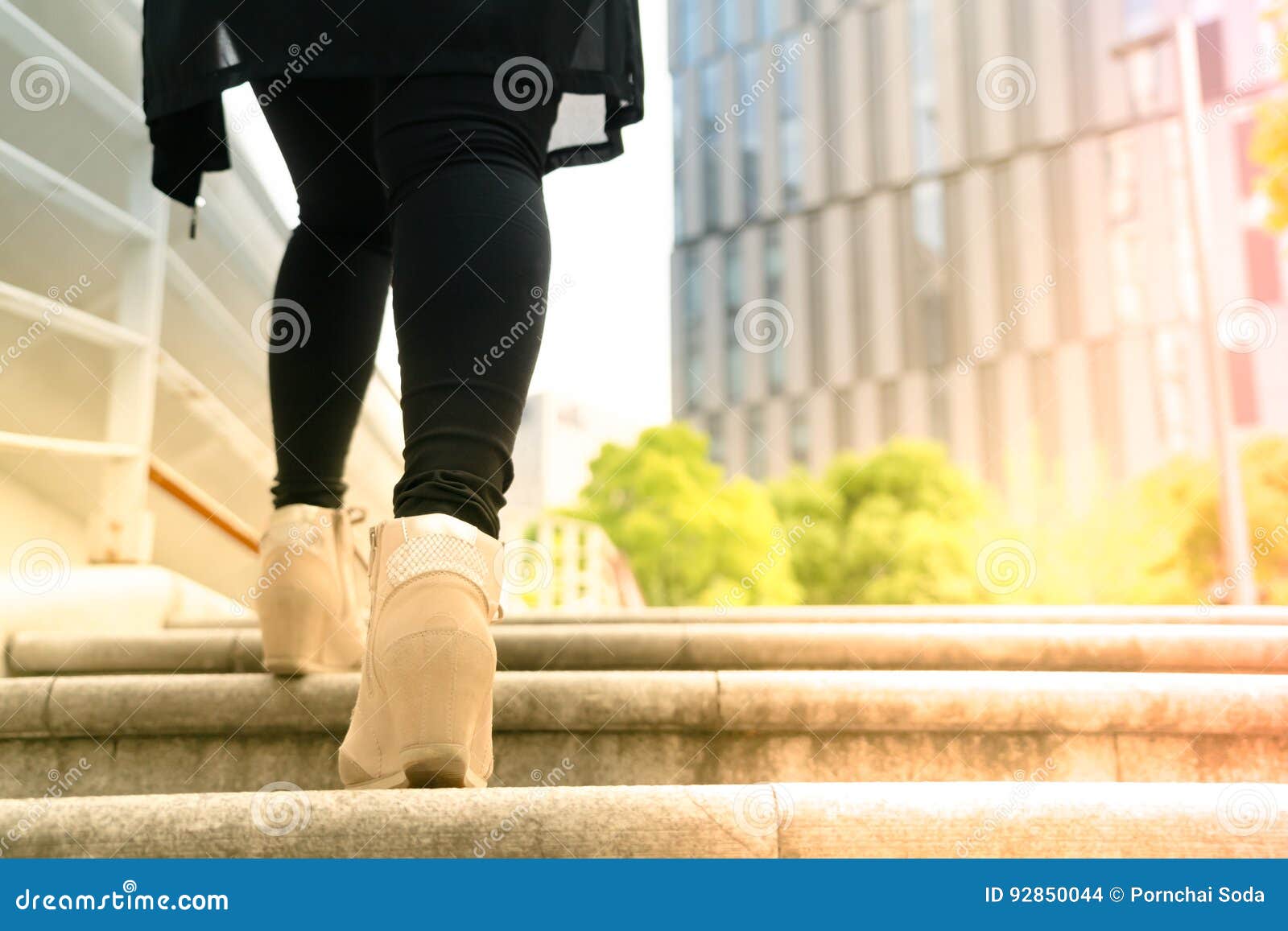 A Business Women is Stepping on Stair for Successful Stock Photo ...