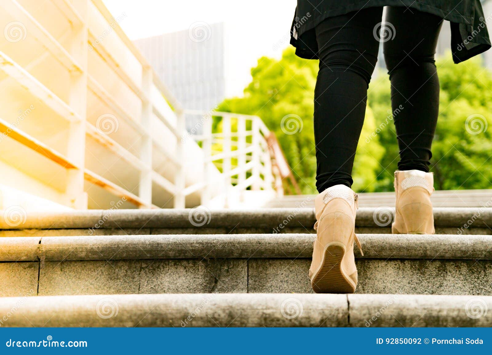 A Business Women is Stepping on Stair for Successful Stock Photo ...