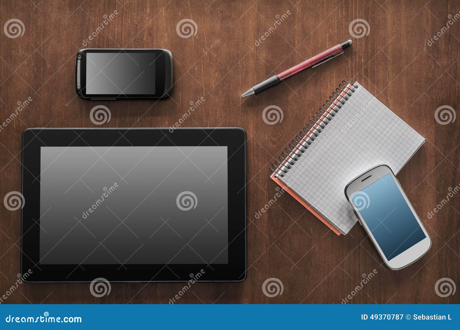 Business Work with Tablet, 2 Smartphones and a Notepad Stock Image ...