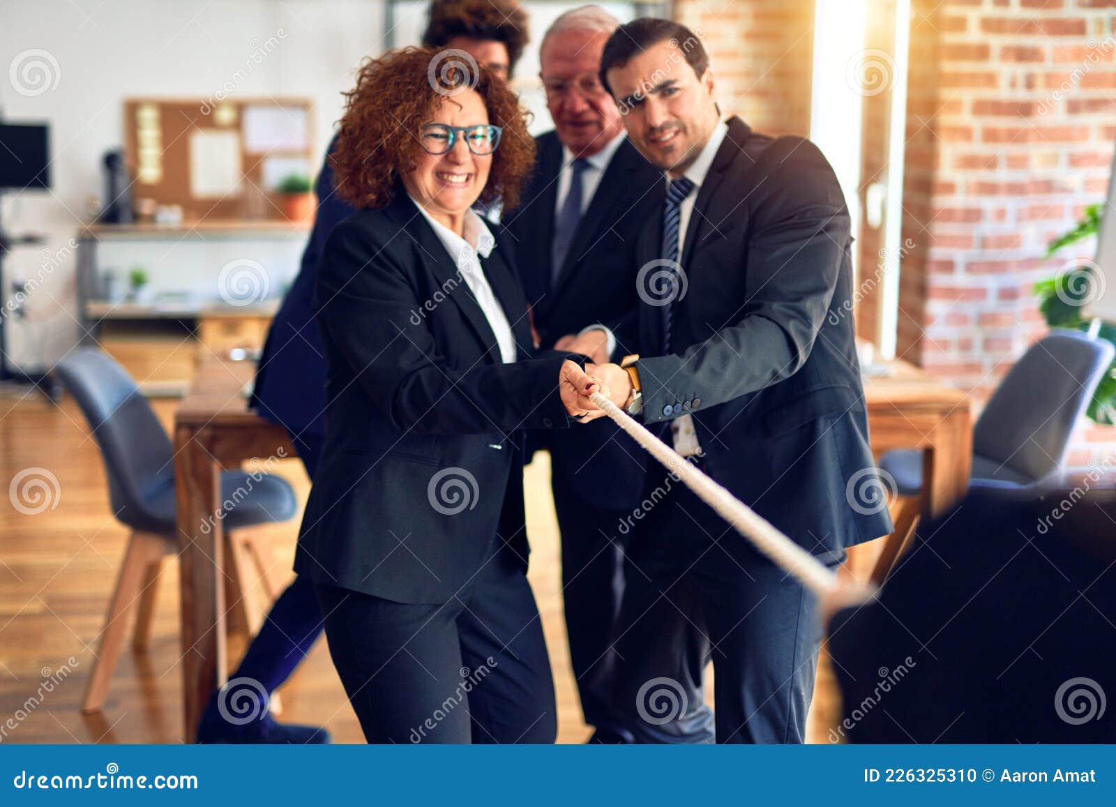 Business Workers Stretching Rope at the Office Stock Photo - Image of ...