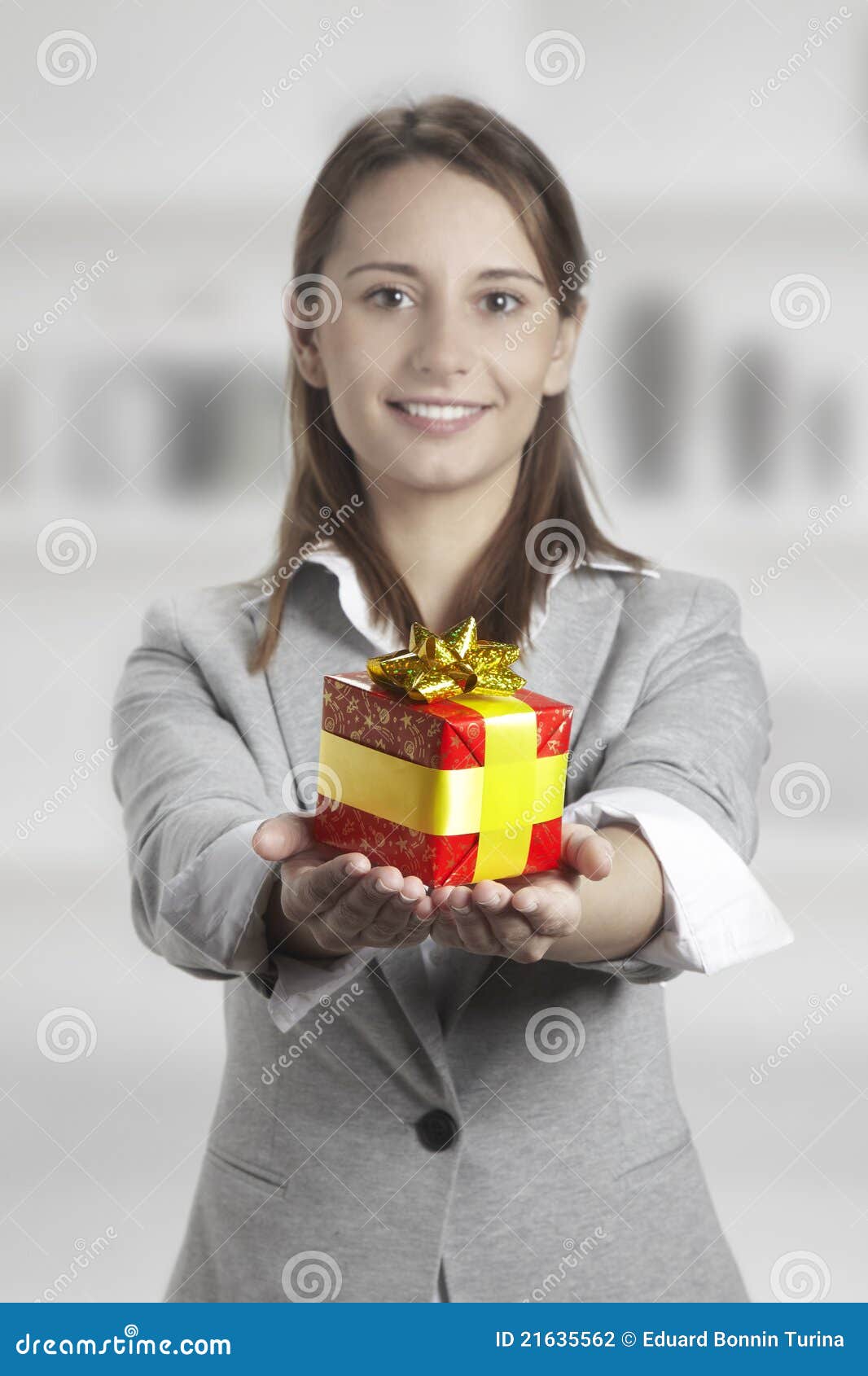 Business Young Woman Holding Present Stock Photo - Image of model, gift ...