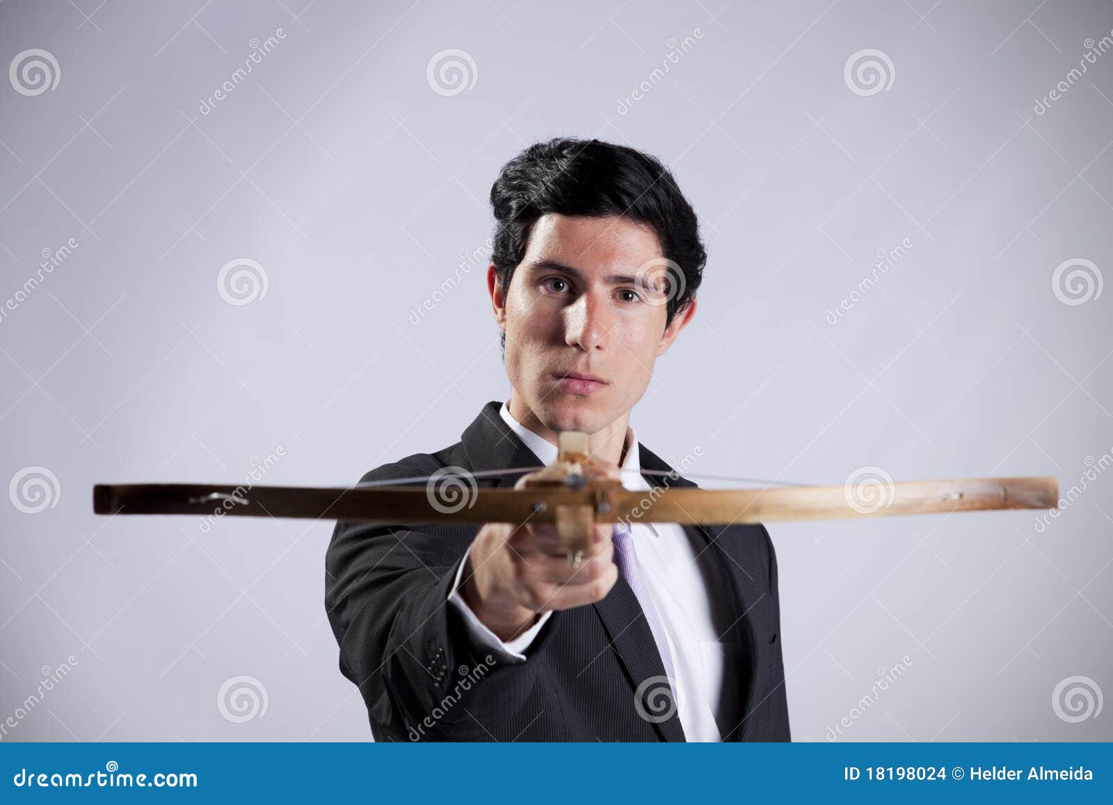 Businessman Aiming with a Crossbow Stock Photo - Image of crossbow ...