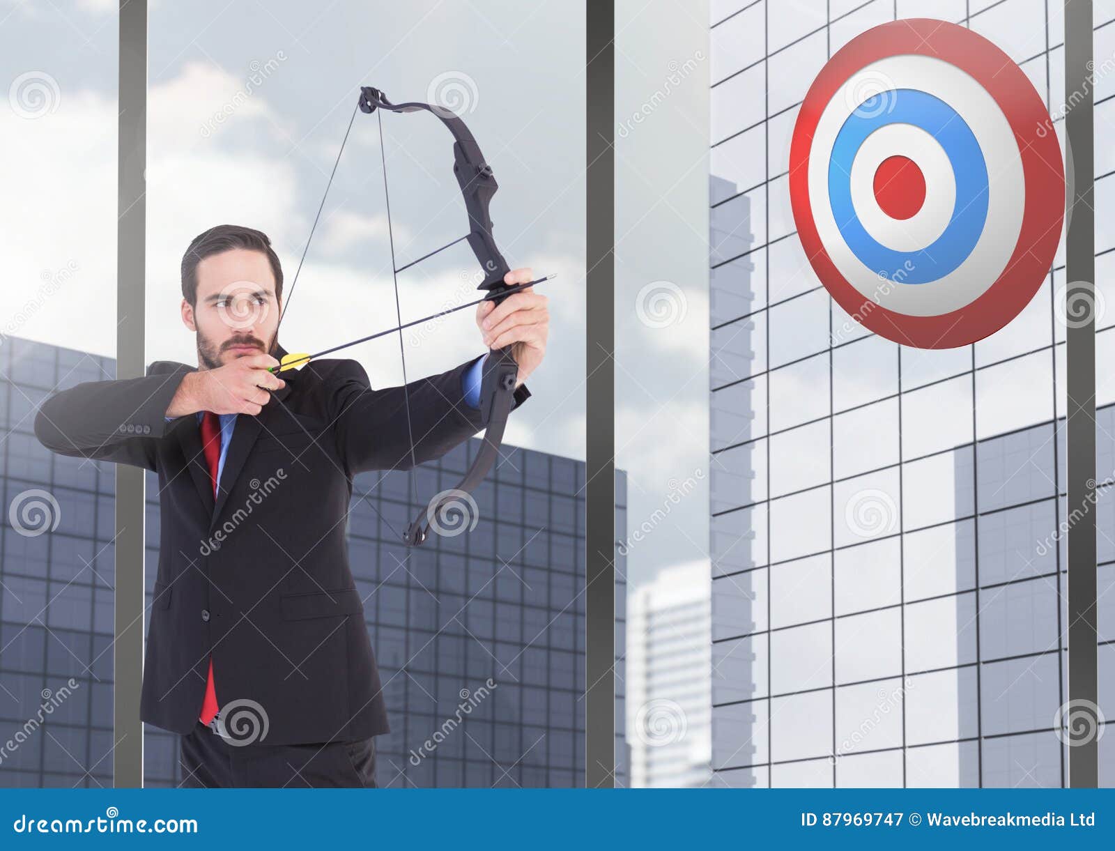 Businessman Aiming at the Target Board Against Office Buildings in ...