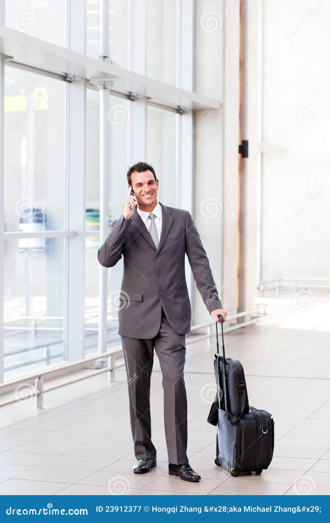 Businessman at airport stock image. Image of laughing - 23912377