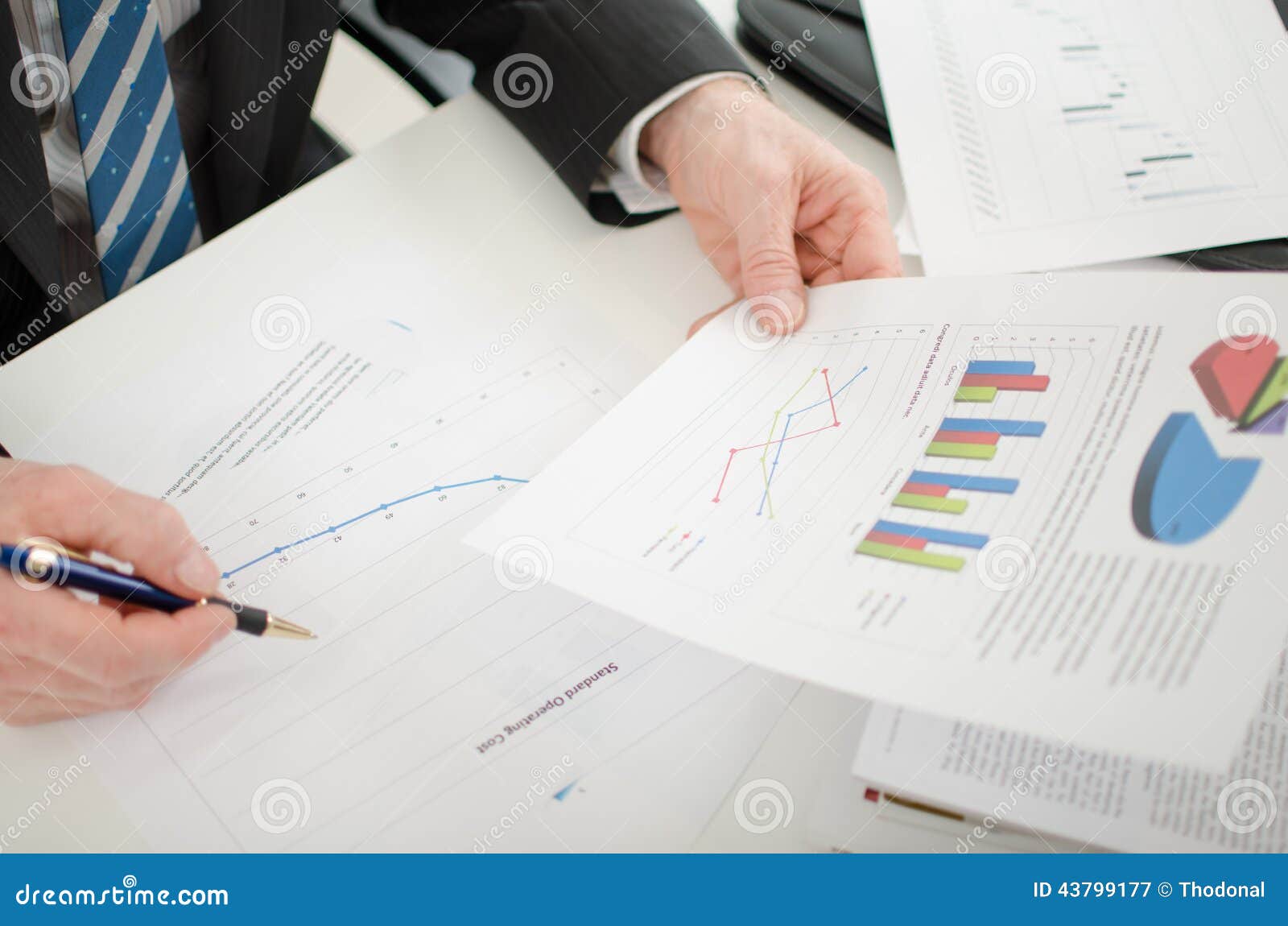 Businessman Analysing Different Graphs Stock Image - Image of worker ...