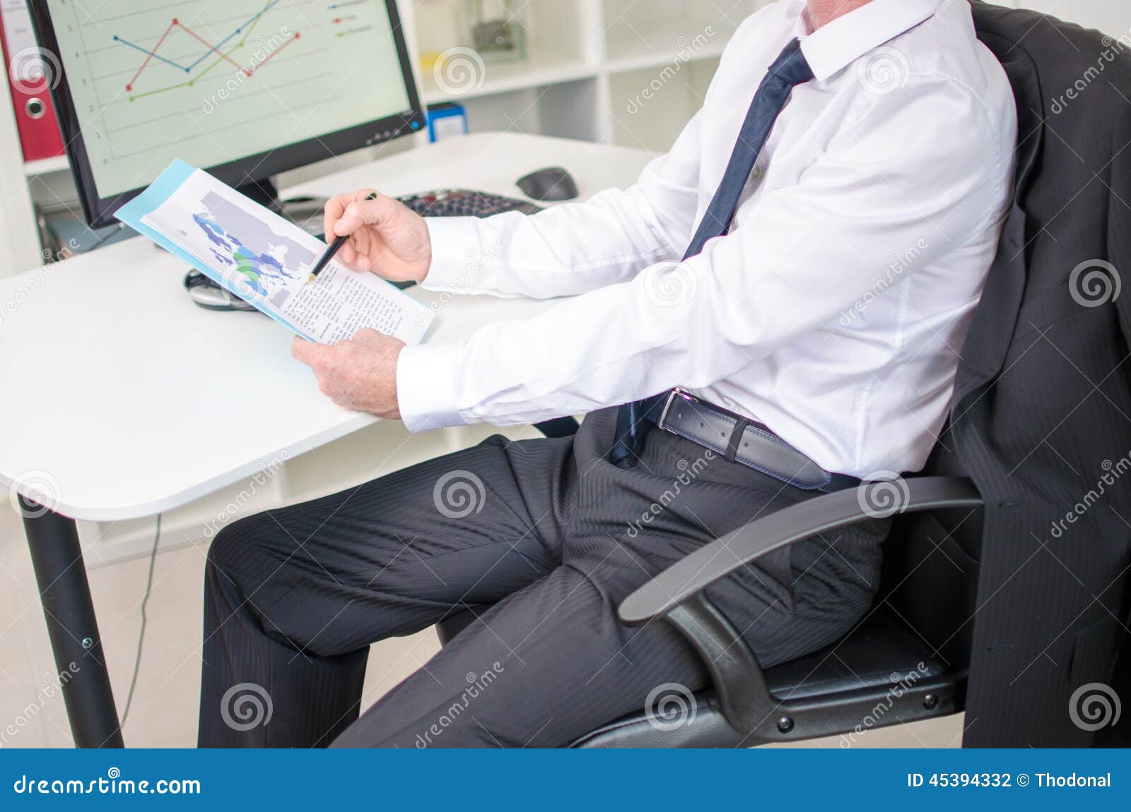 Businessman Analysing Documents Stock Photo - Image of analytics ...