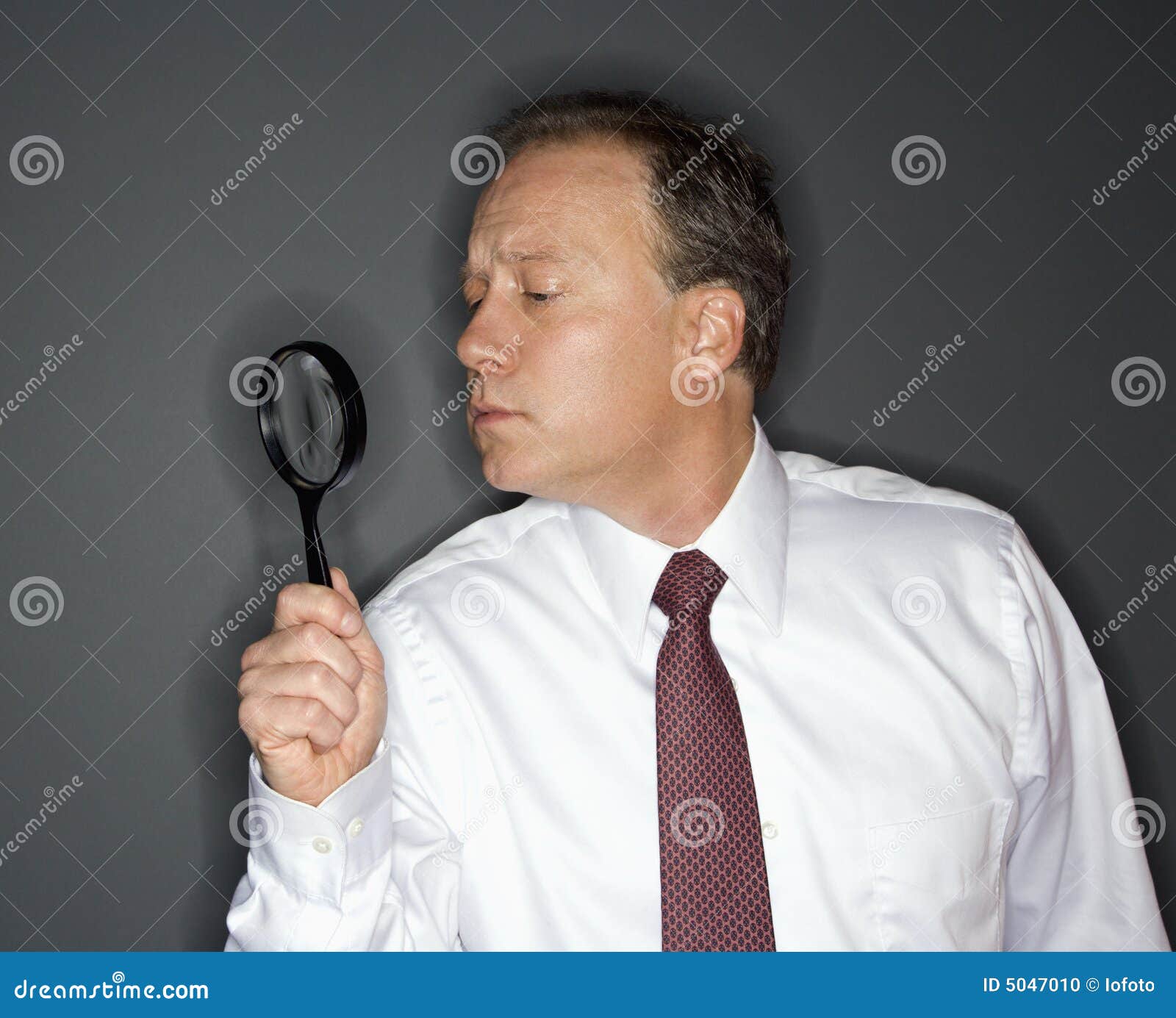 Businessman analyzing stock photo. Image of businessman - 5047010