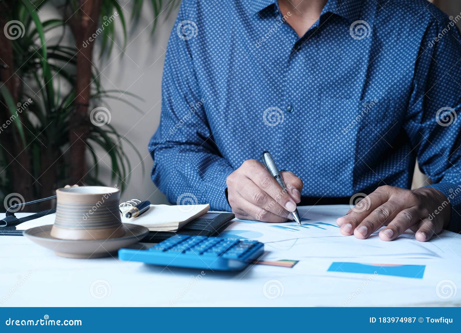 Businessman Analyzing Financial Data at Office Desk Stock Image - Image ...
