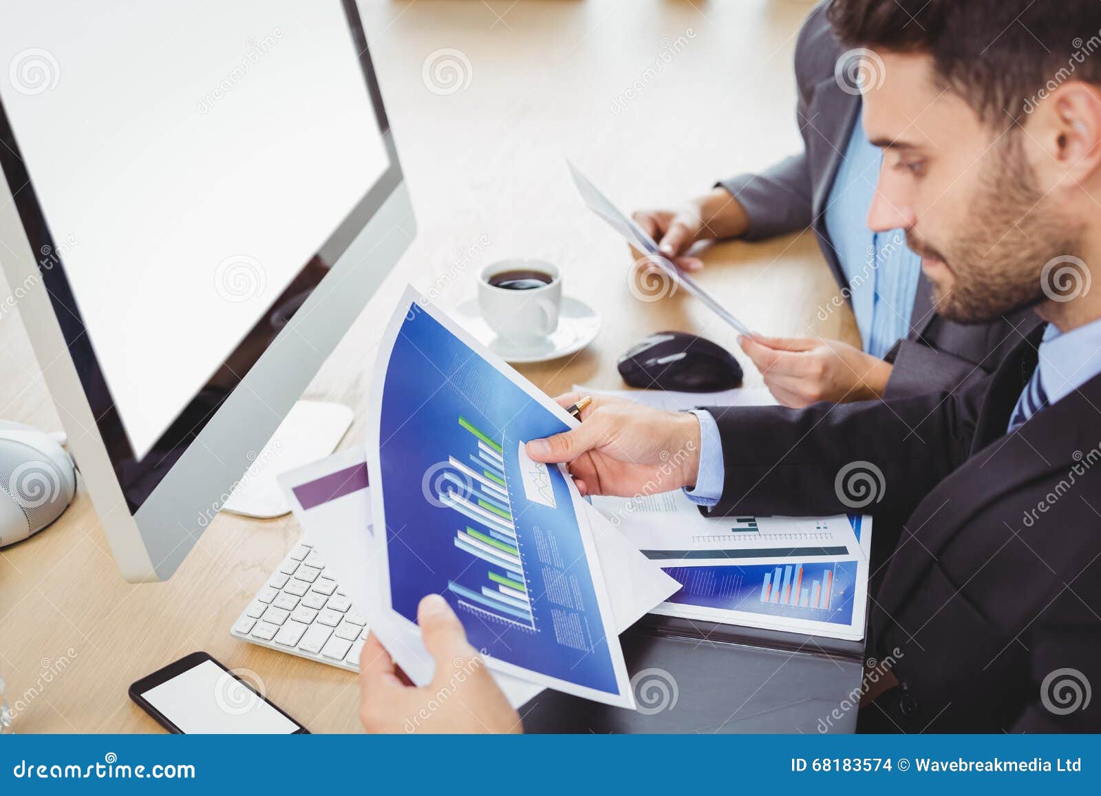 Businessman Analyzing Graph at Computer Desk Stock Photo - Image of ...