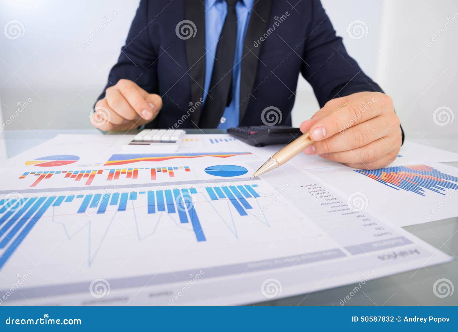 Businessman Analyzing Graph Papers Stock Photo - Image of button ...