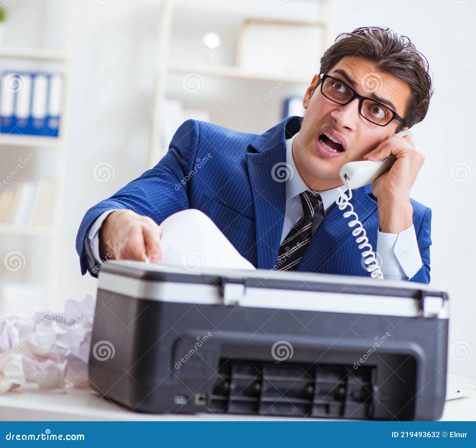 Businessman Angry at Copying Machine Jamming Papers Stock Photo - Image ...