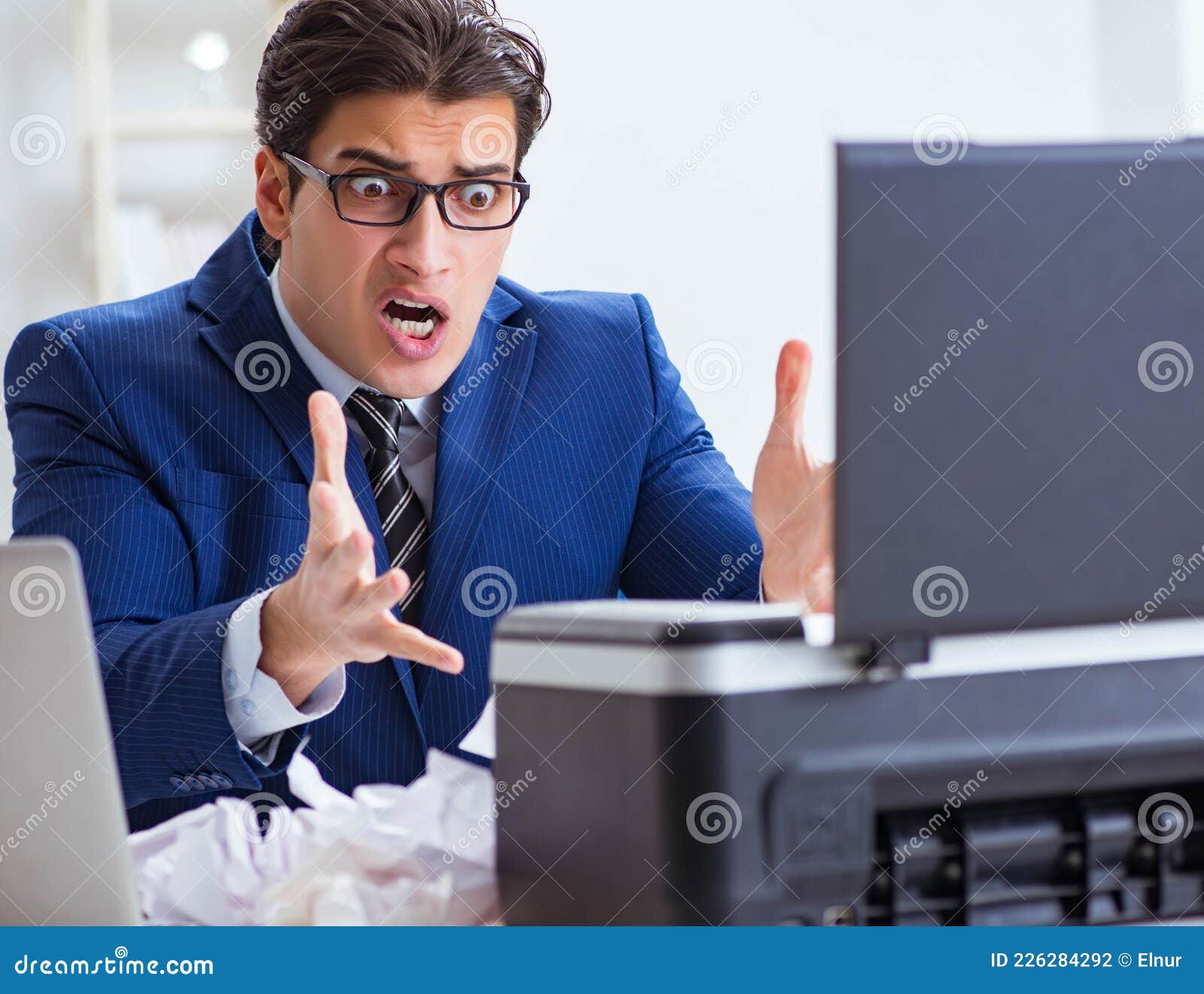Businessman Angry at Copying Machine Jamming Papers Stock Photo - Image ...