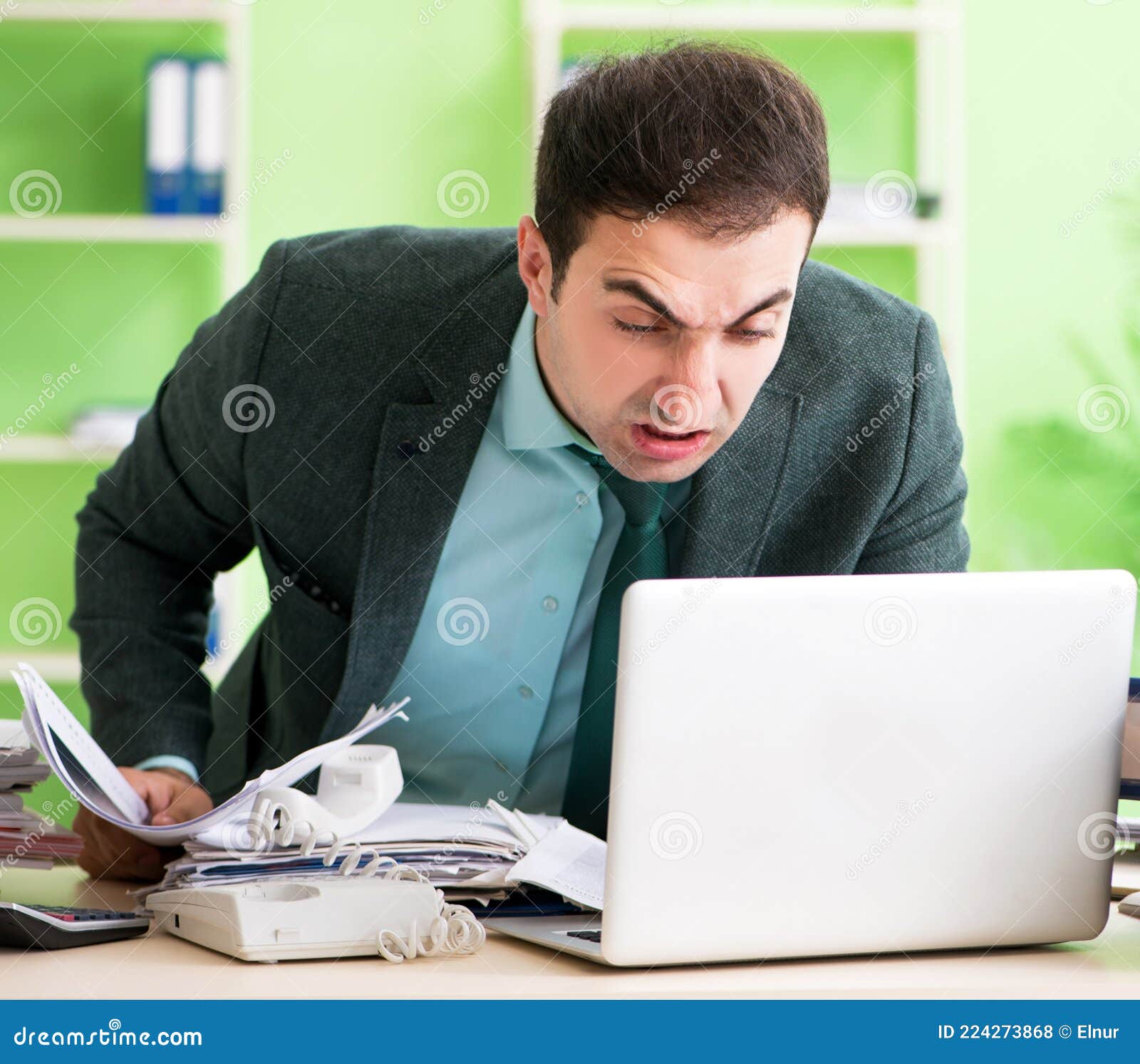 Businessman Angry with Excessive Work Sitting in the Office Stock Photo ...