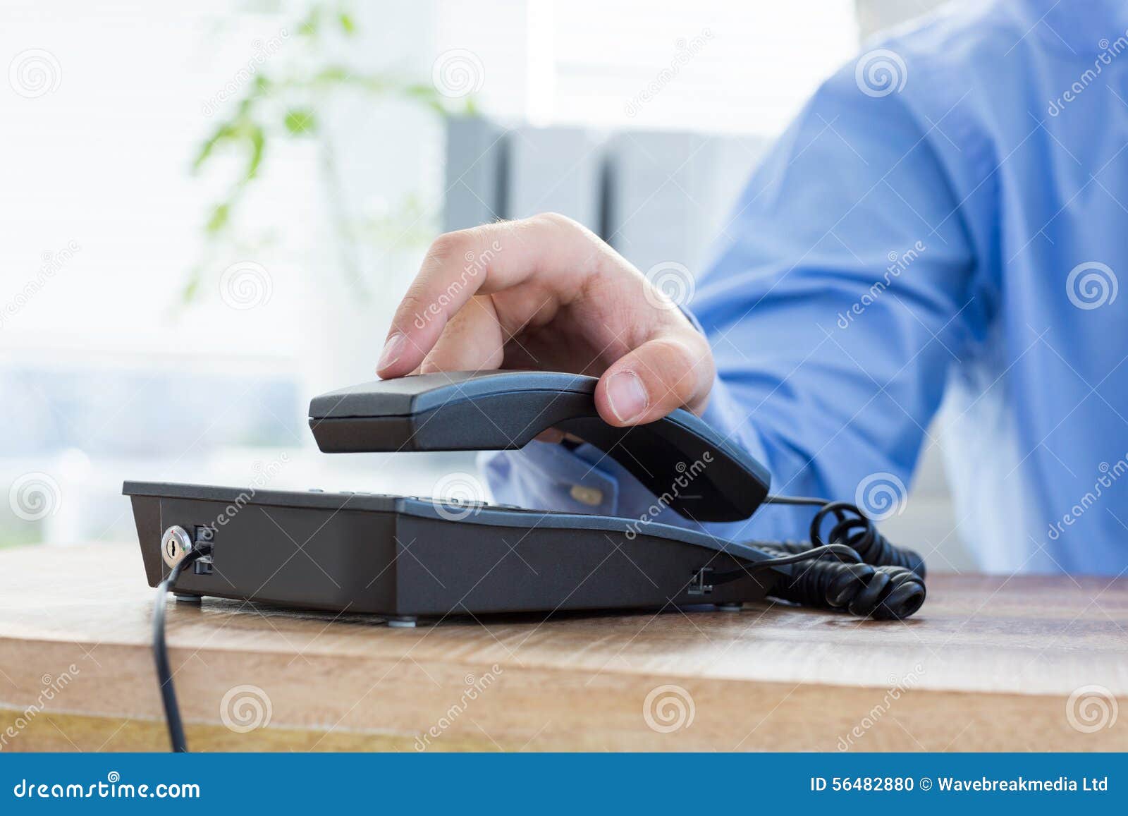 Businessman Answer the Phone Stock Photo - Image of stylish, indoors ...