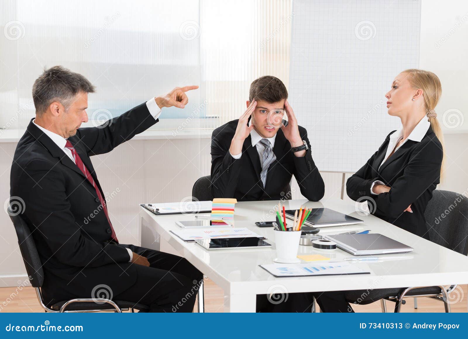 Businessman Arguing with His Two Co-workers Stock Image - Image of ...