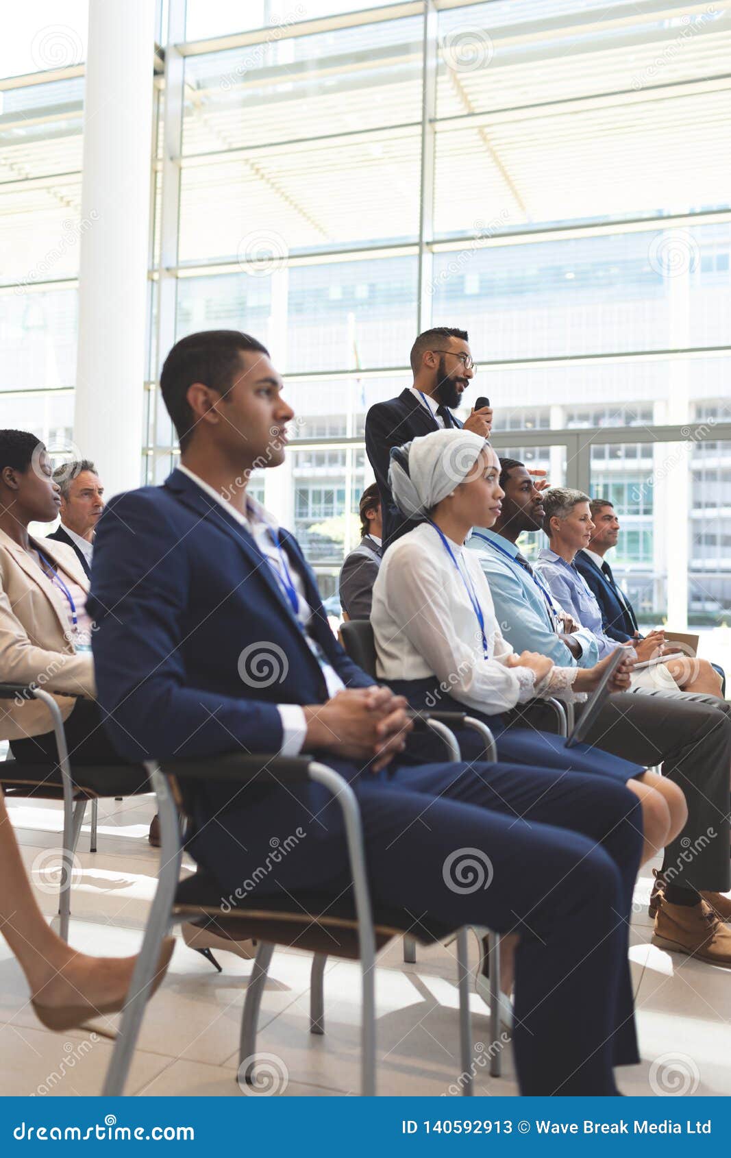 Businessman Asking Question during Seminar Stock Image - Image of ...