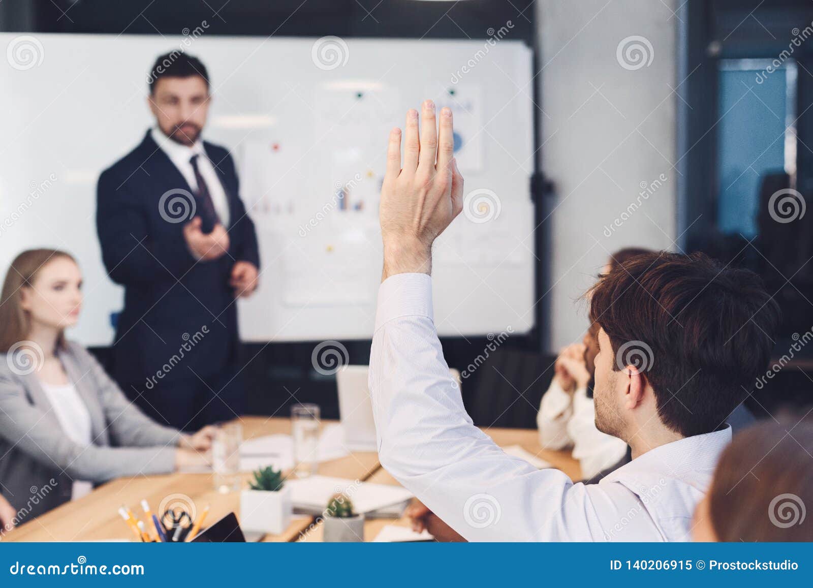 Businessman Asking Question To Speaker at Presentation Stock Image ...