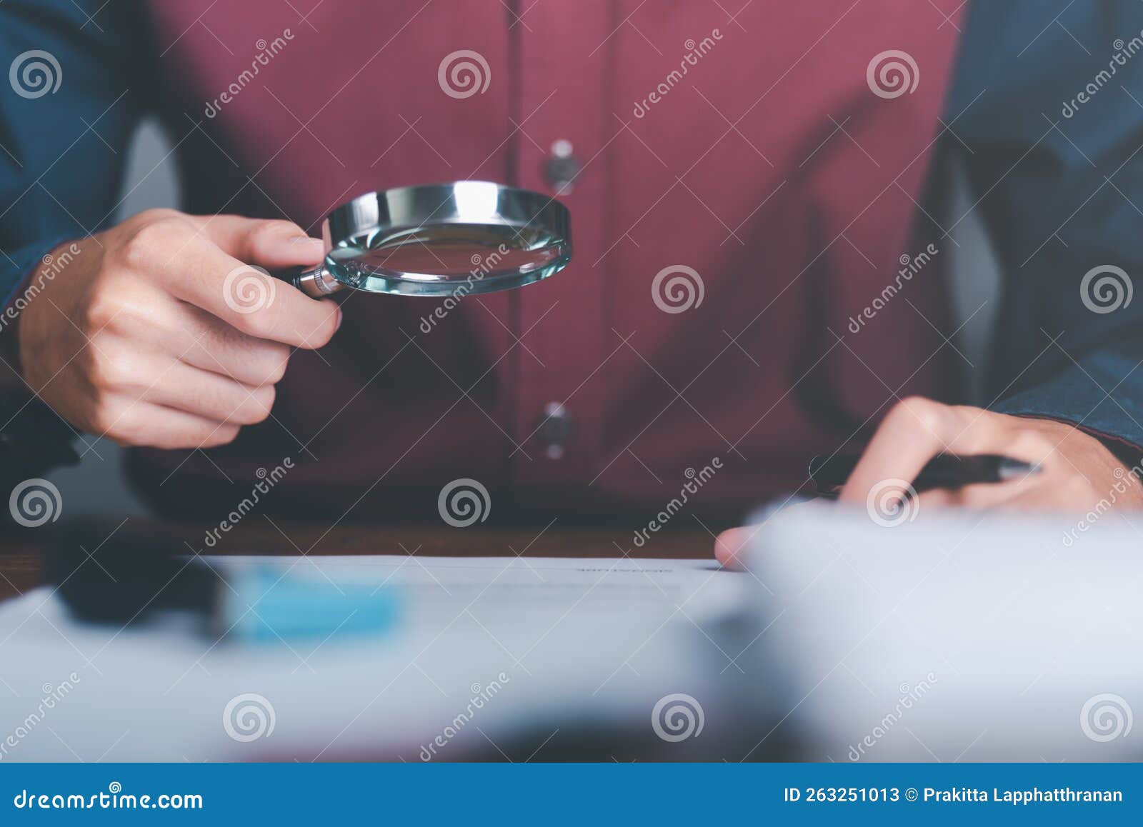 Businessman Audit Documents with a Magnifying Glass, Quality Assessment ...