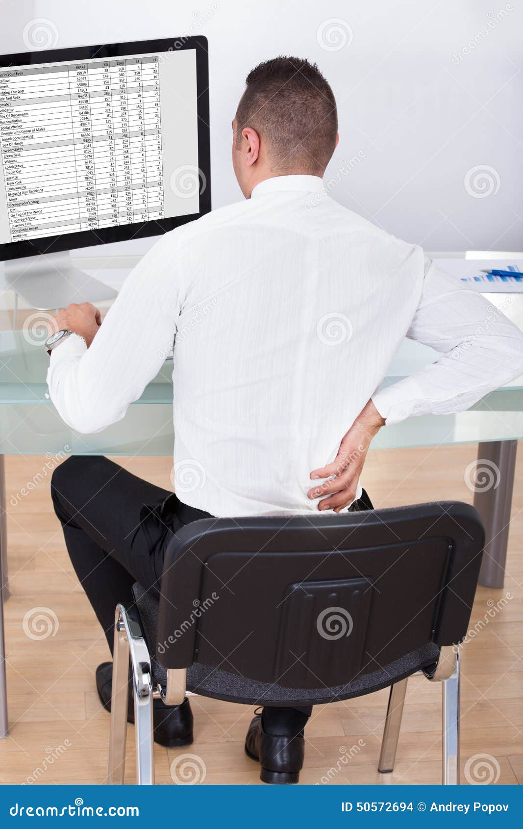 Businessman with Backache Using Computer at Desk Stock Photo - Image of ...