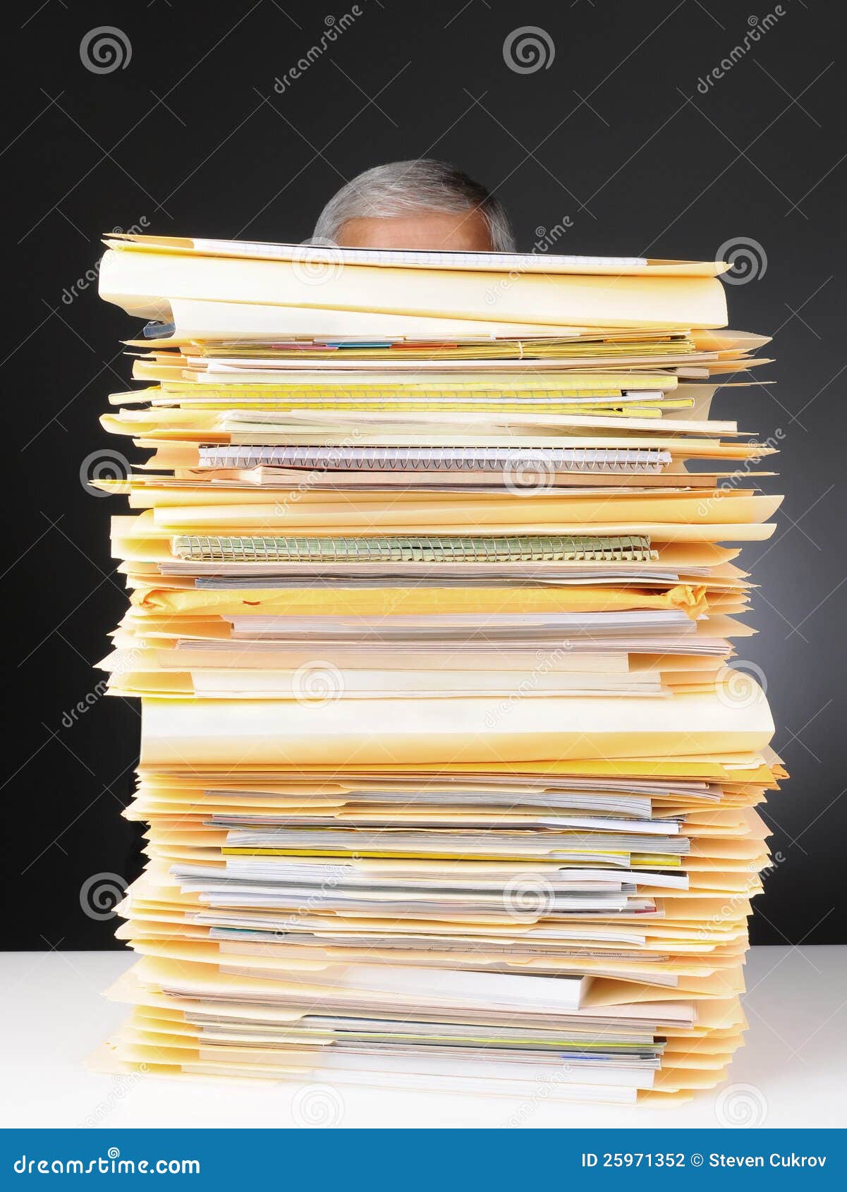 Businessman Behind Stack of Files Stock Photo - Image of files, papers ...