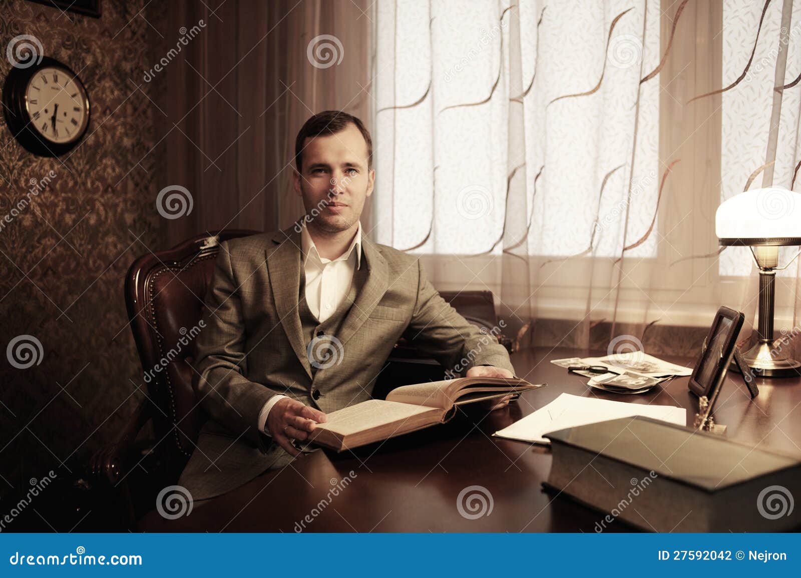 Businessman behind table stock photo. Image of elegant - 27592042