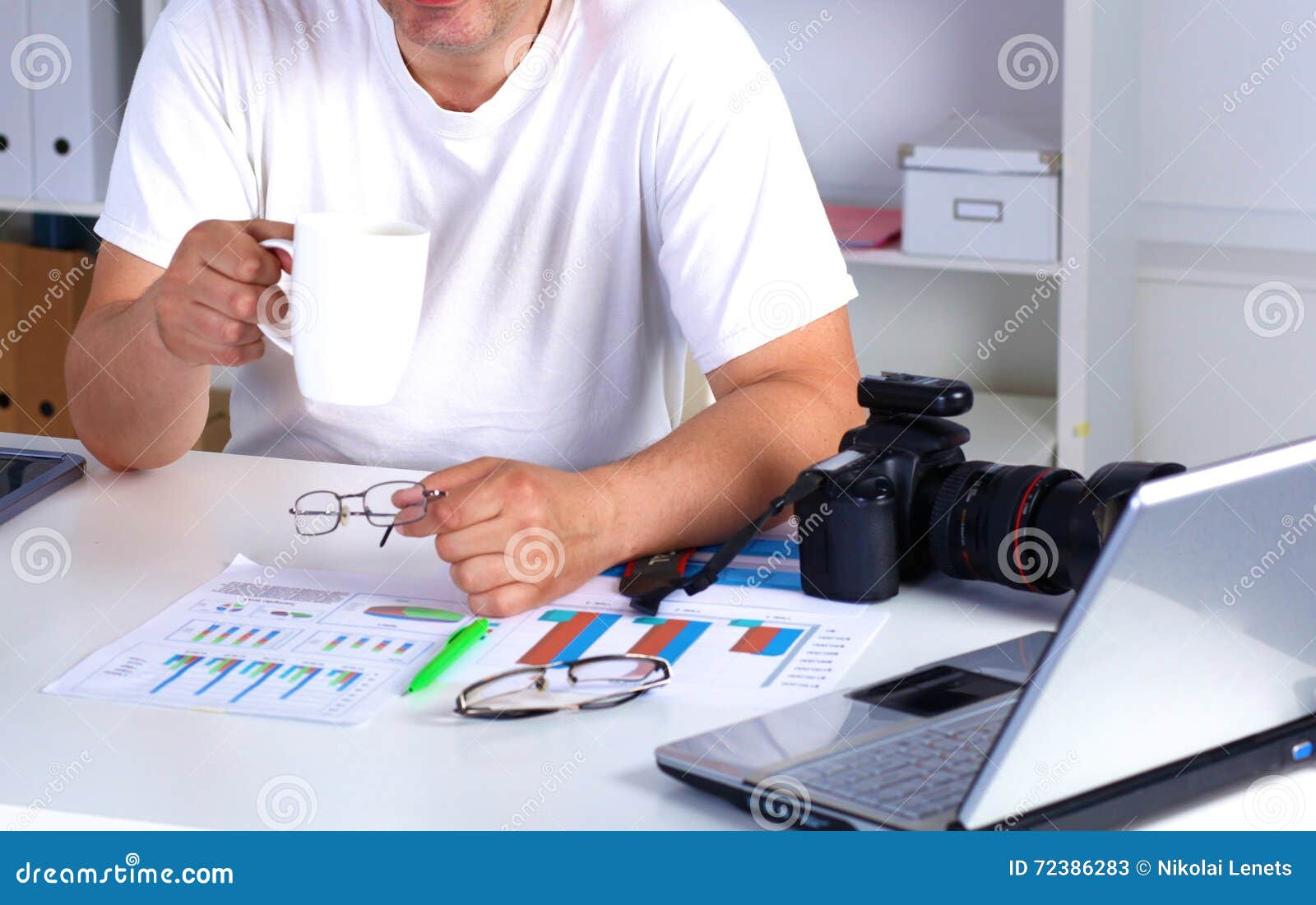 A Businessman Behind a Table with Graphics Stock Image - Image of ...