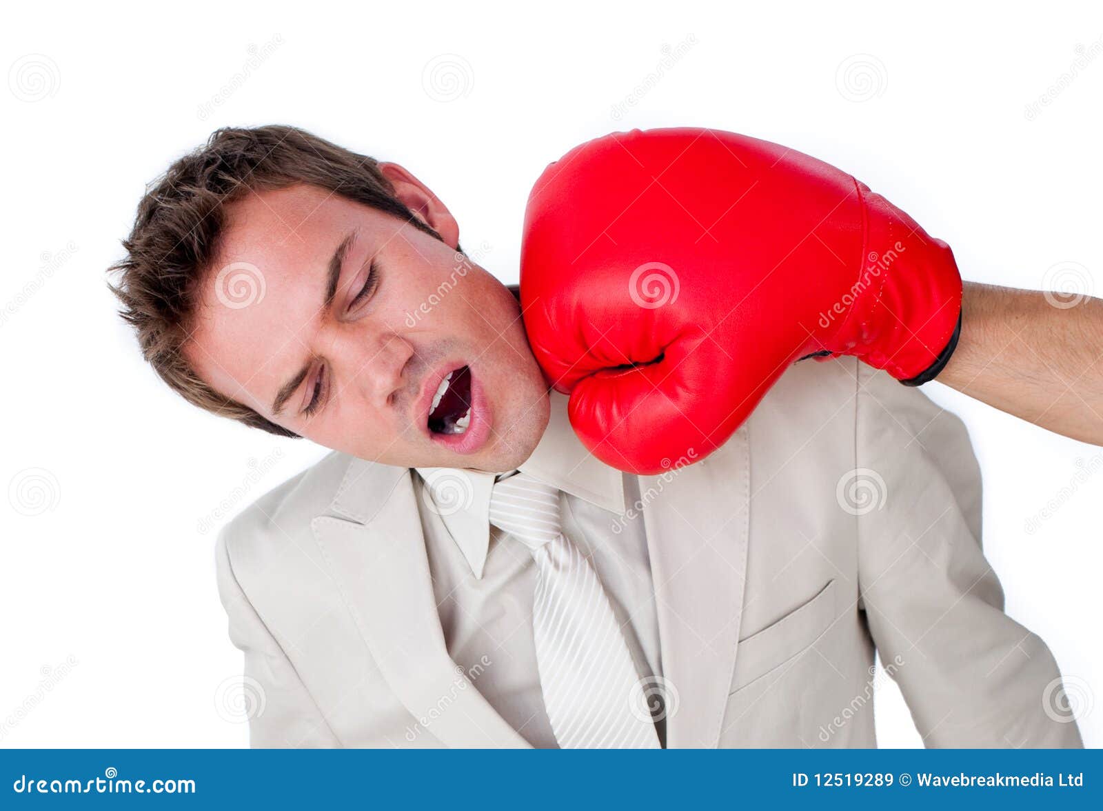 Businessman Being Hit with a Boxing Glove Stock Image - Image of ...