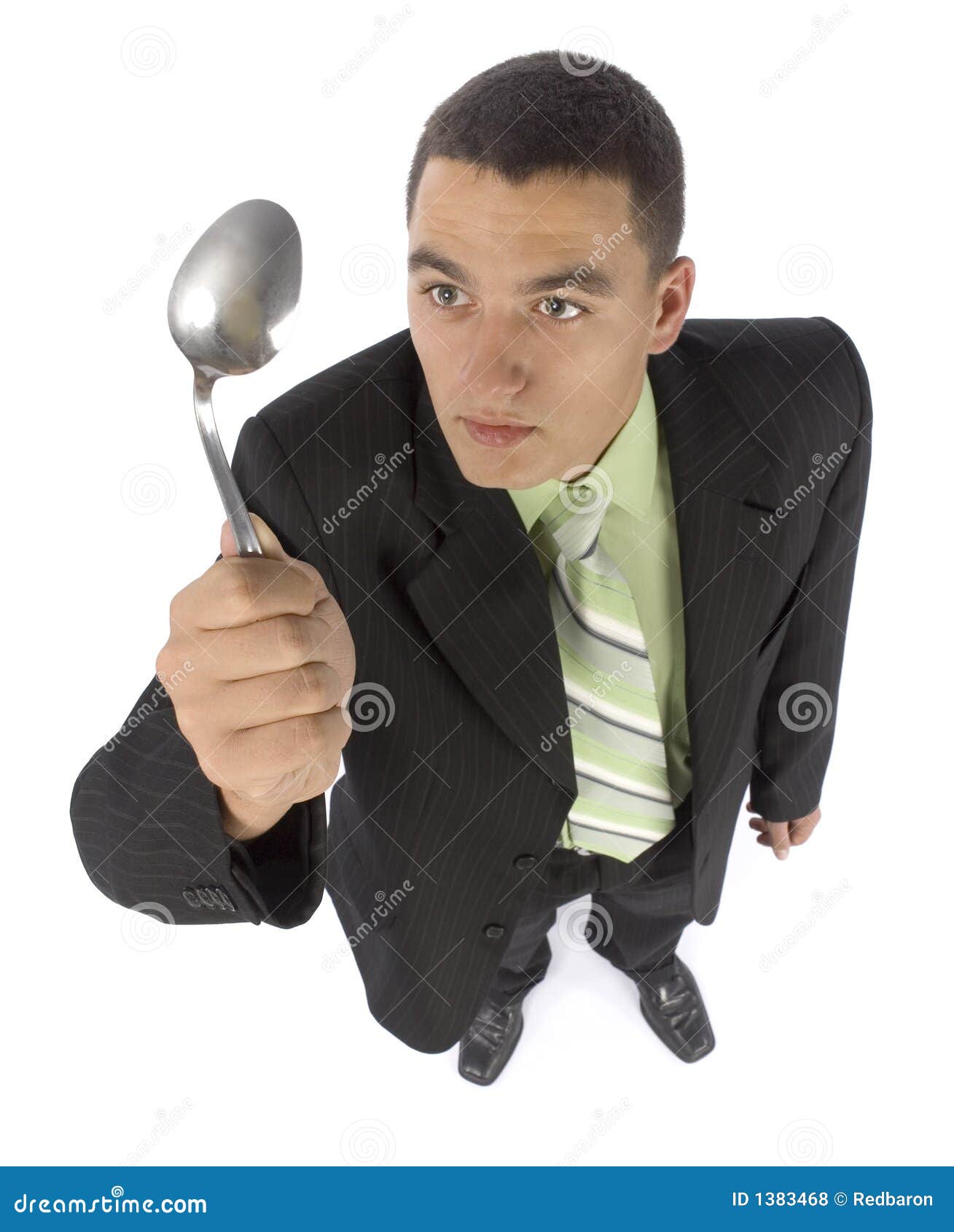 Businessman Bending Spoon by Mind Force Stock Photo - Image of faculty ...