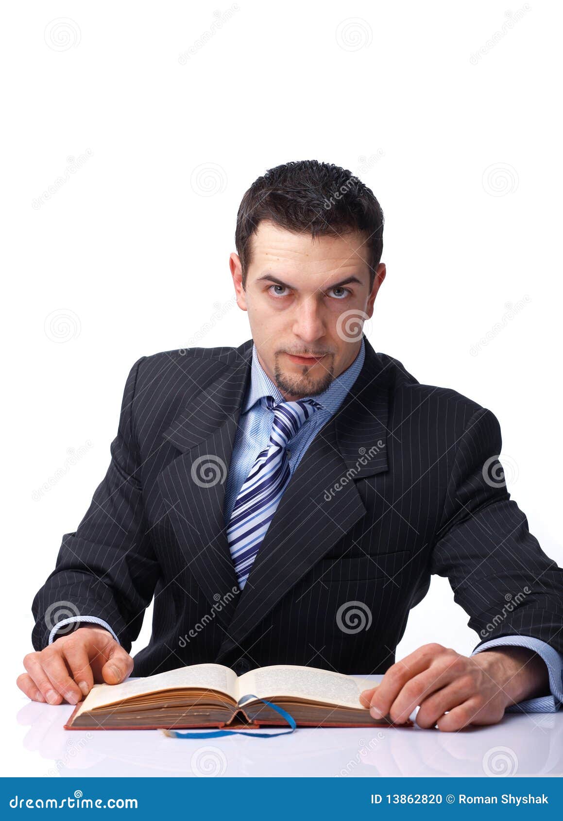 Businessman with a Book. stock photo. Image of mature - 13862820