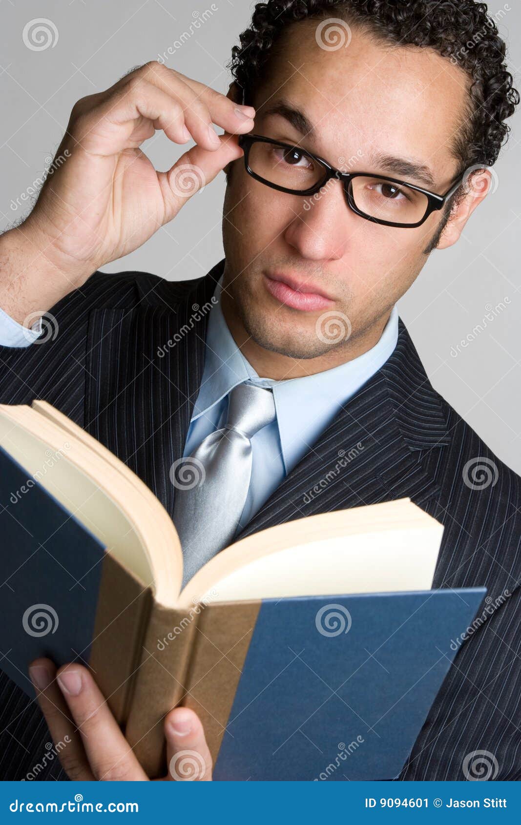 Businessman with Book stock image. Image of education - 9094601