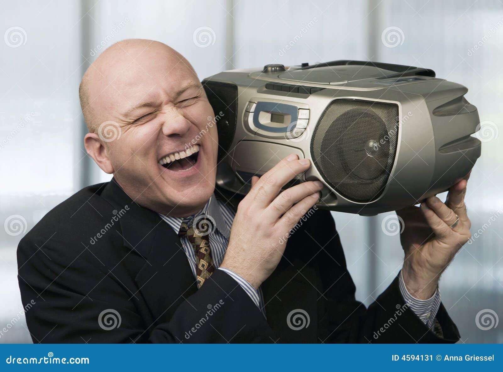 Businessman with Boom Box stock image. Image of bald, portable - 4594131