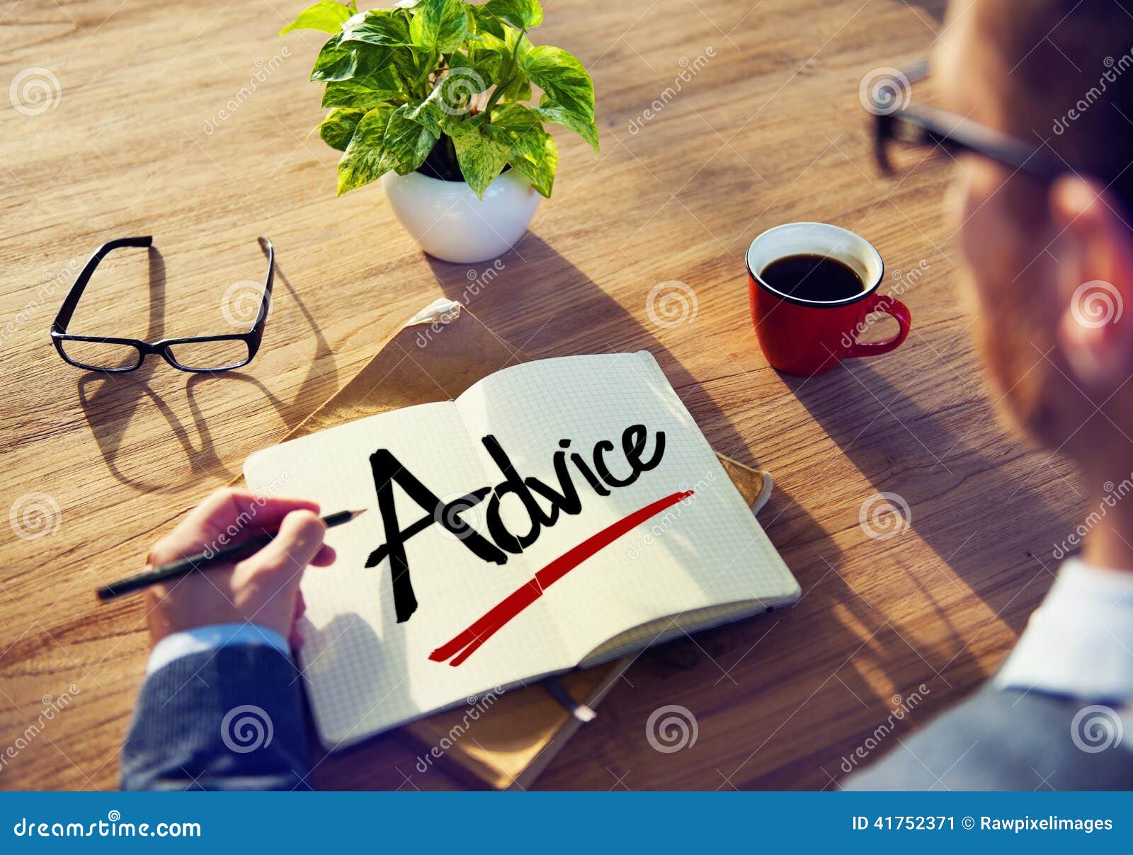 Businessman Brainstorming and Writing the Word Advice Stock Image ...