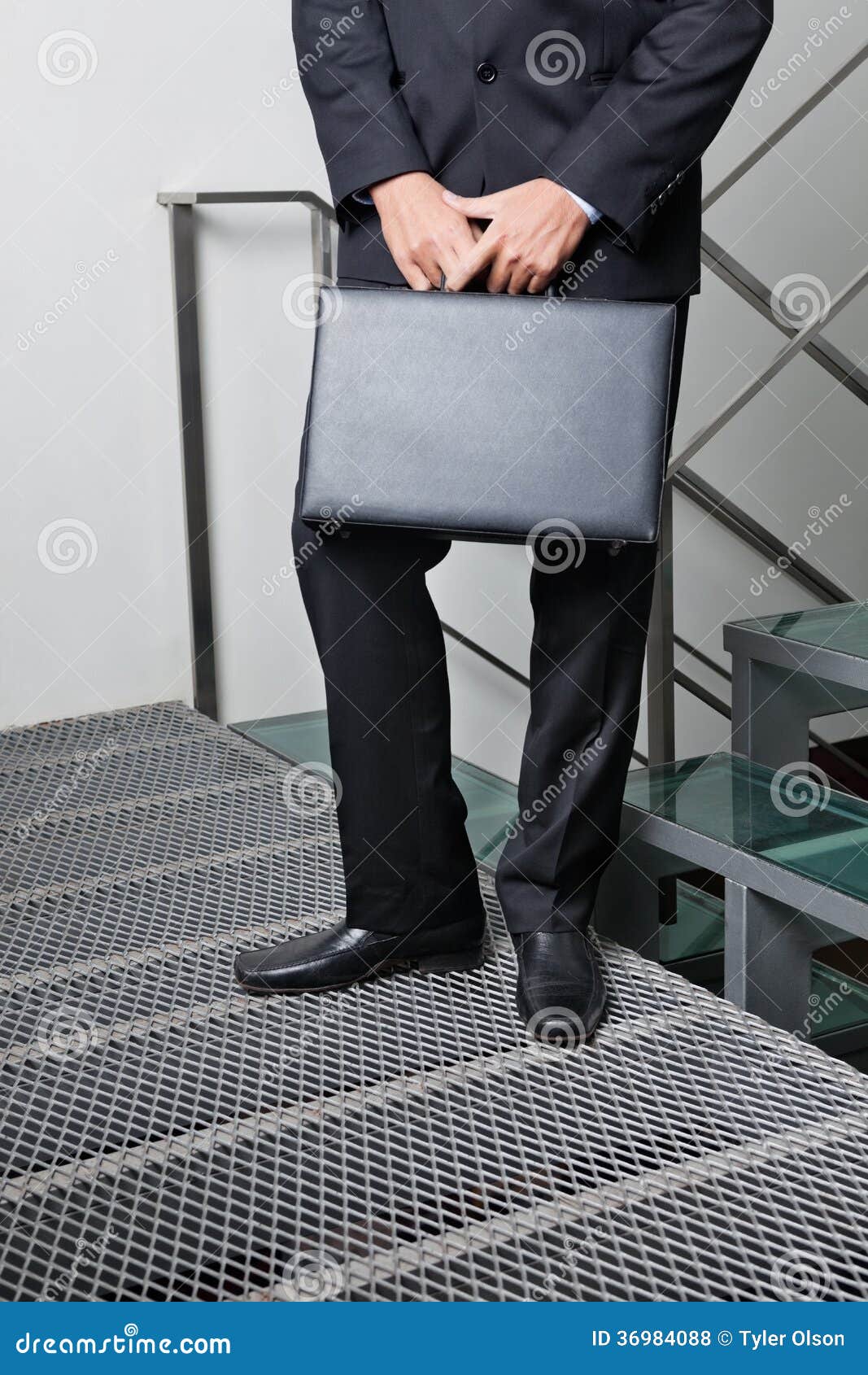 Businessman with Briefcase Standing by Steps Stock Photo - Image of ... Businessman with Briefcase Standing by Steps Stock Photo - Image of ...