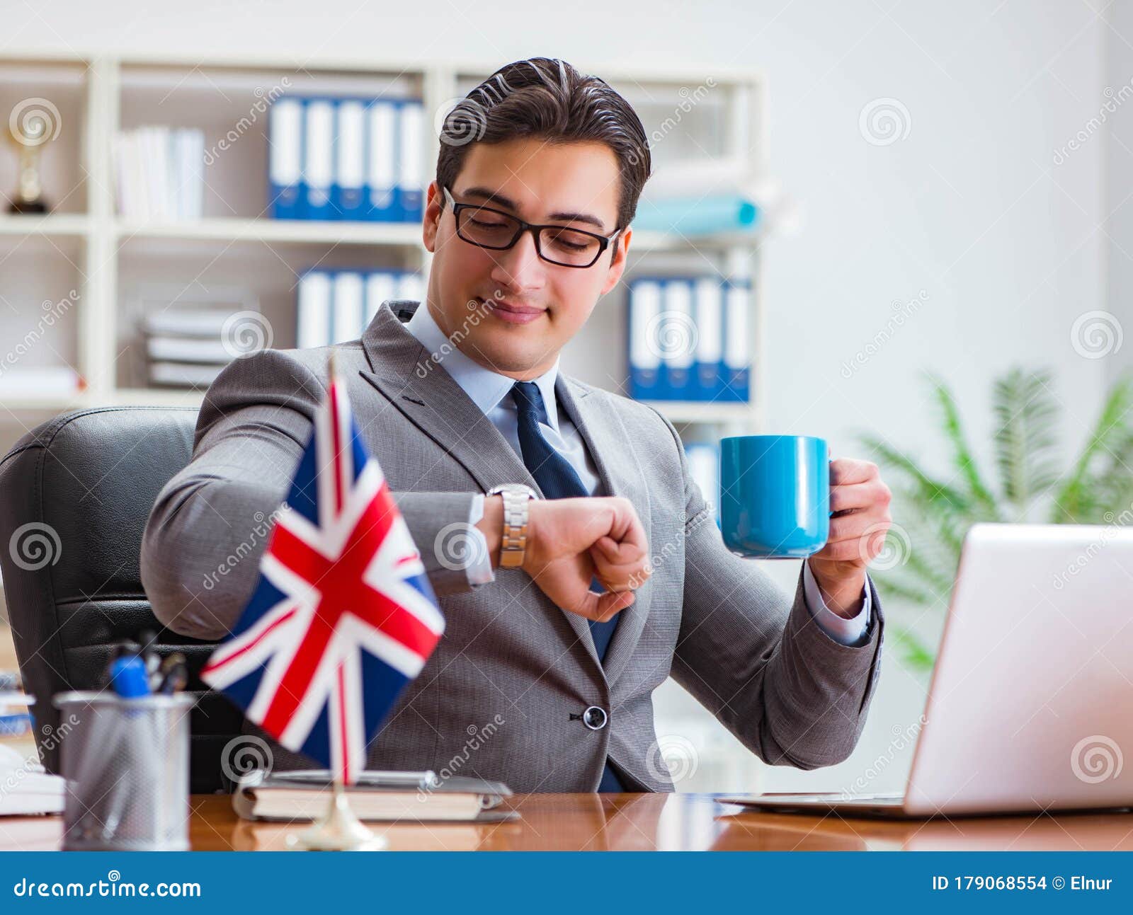 Businessman with British Flag in the Office Stock Photo - Image of ...