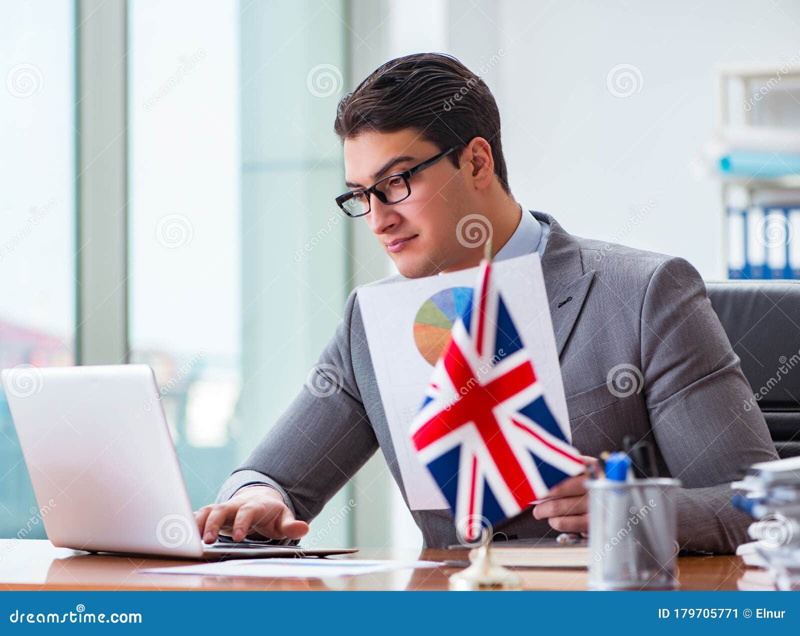 Businessman with British Flag in the Office Stock Image - Image of ...