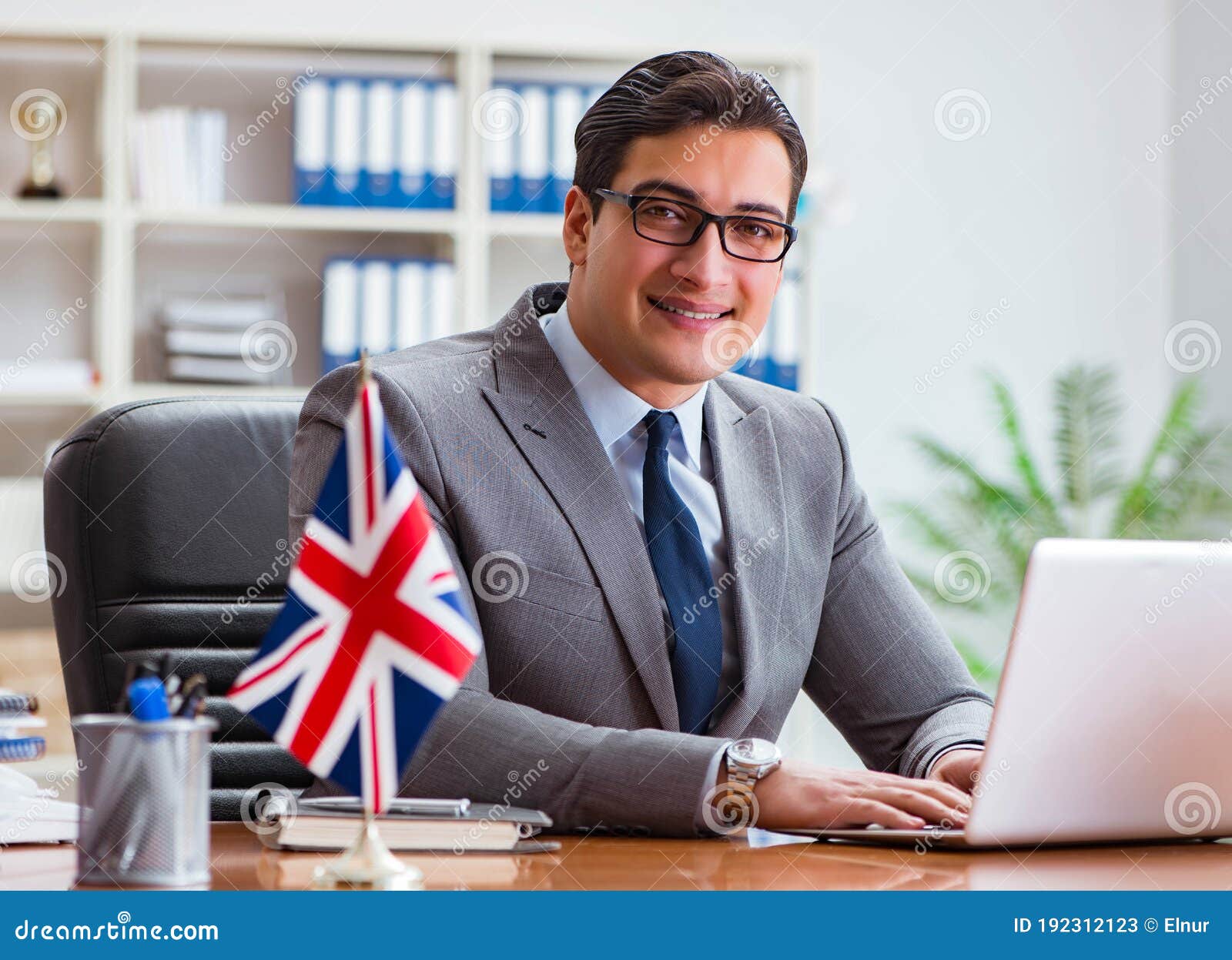 Businessman with British Flag in the Office Stock Image - Image of ...