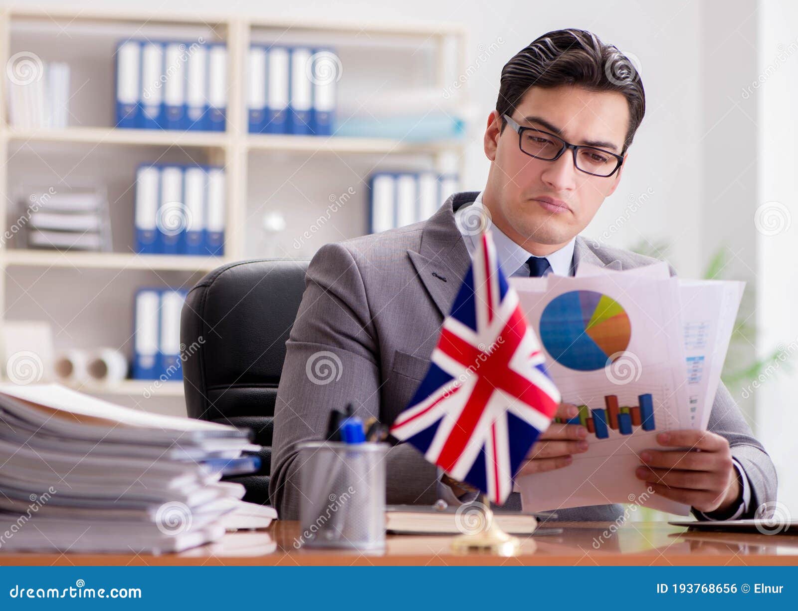 Businessman with British Flag in the Office Stock Photo - Image of ...