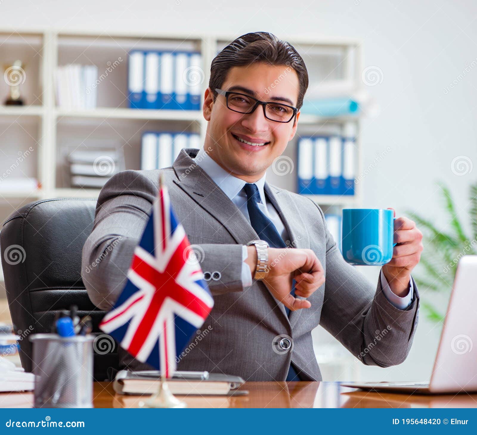 Businessman with British Flag in the Office Stock Photo - Image of ...