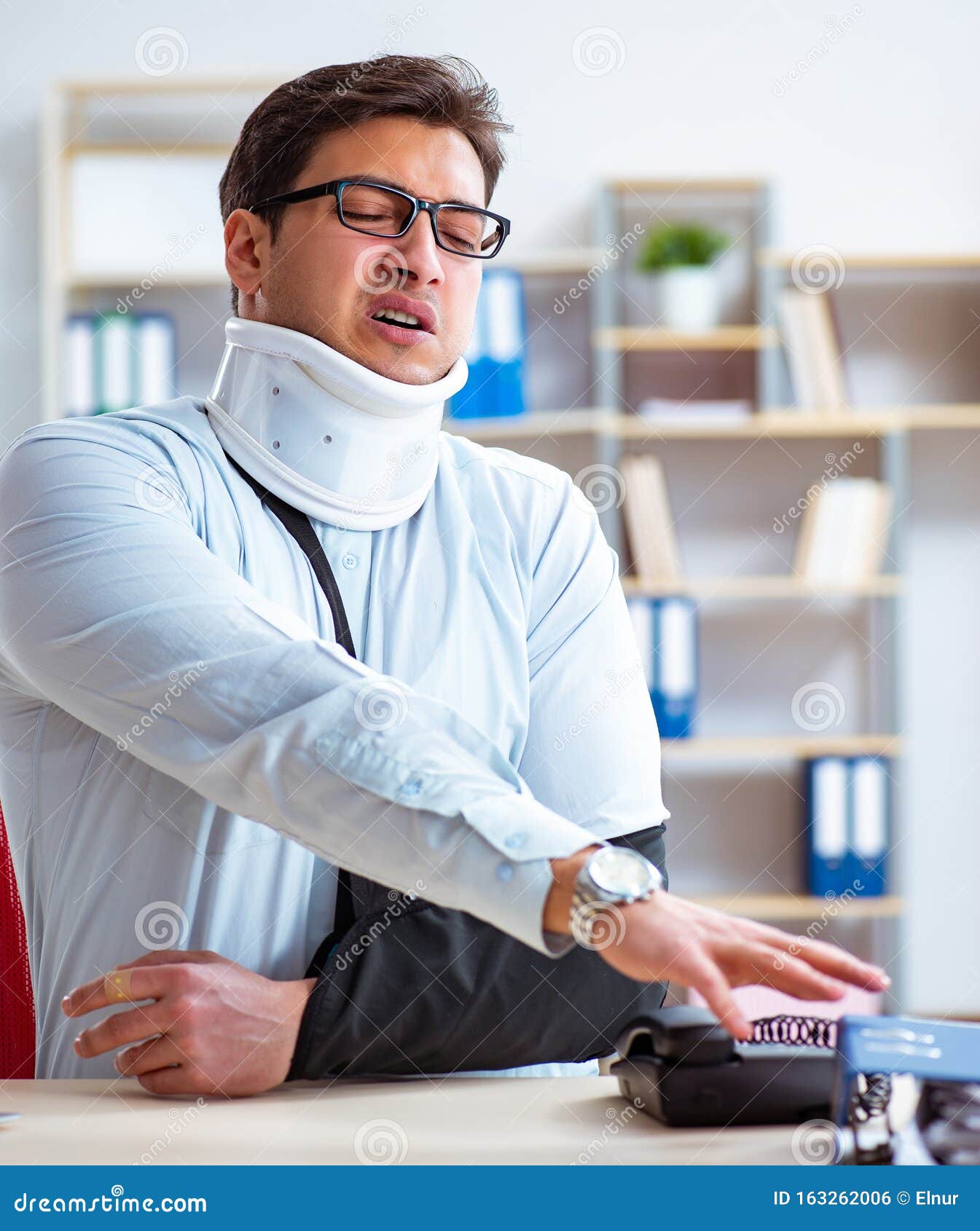 Businessman with Broken Arm Working in Office Stock Photo - Image of ...