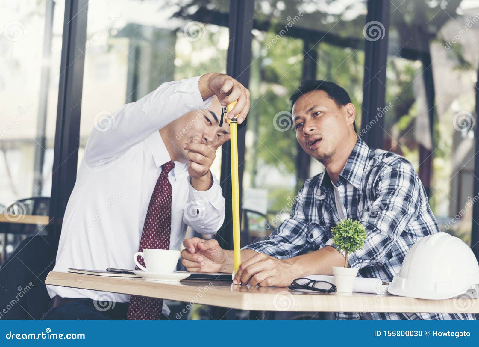 Businessman and Building Contractor are Discussion Stock Photo - Image ...